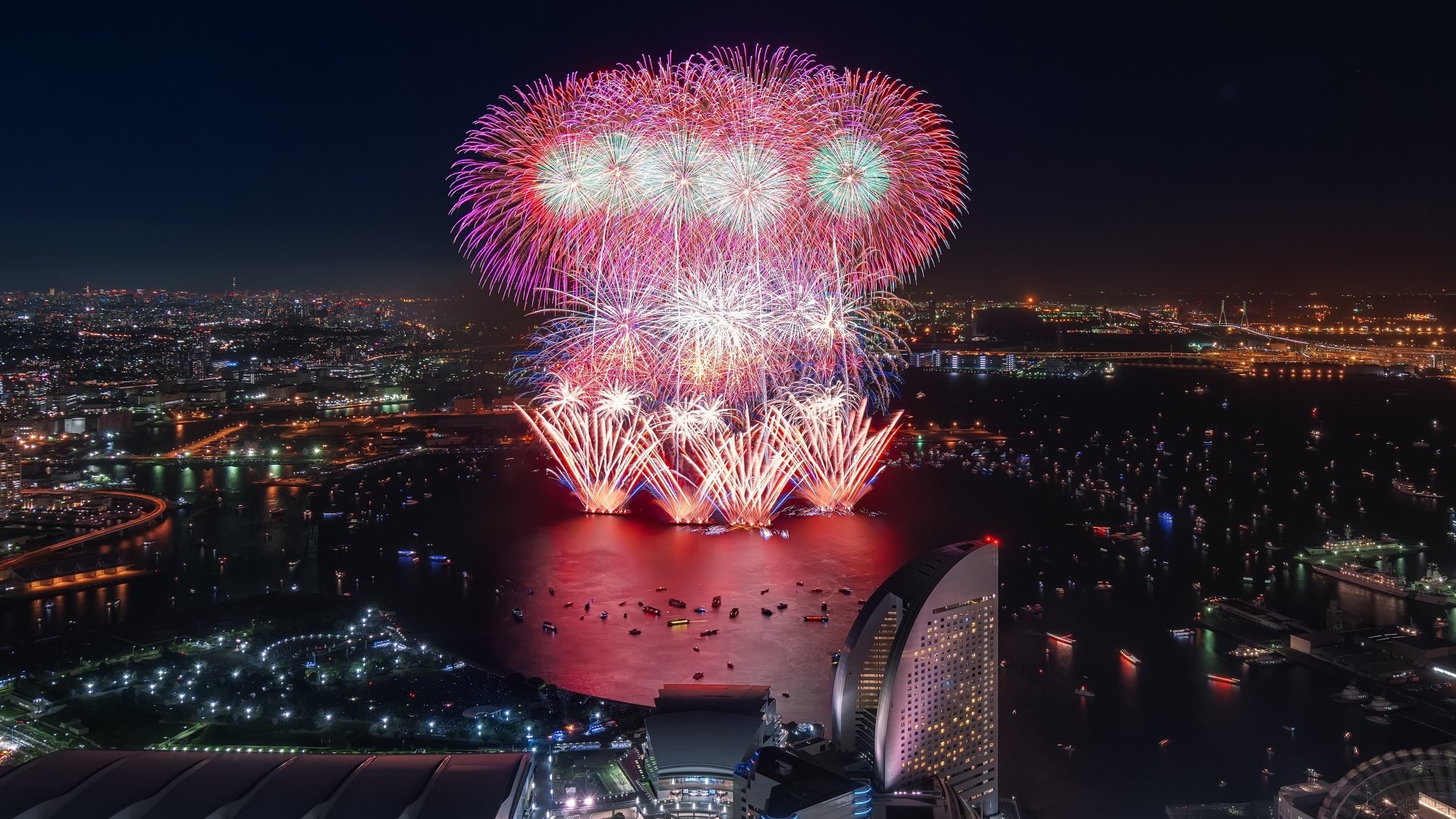 Yokohama Night Fireworks: Stunning 4K Cityscape Celebration Wallpaper