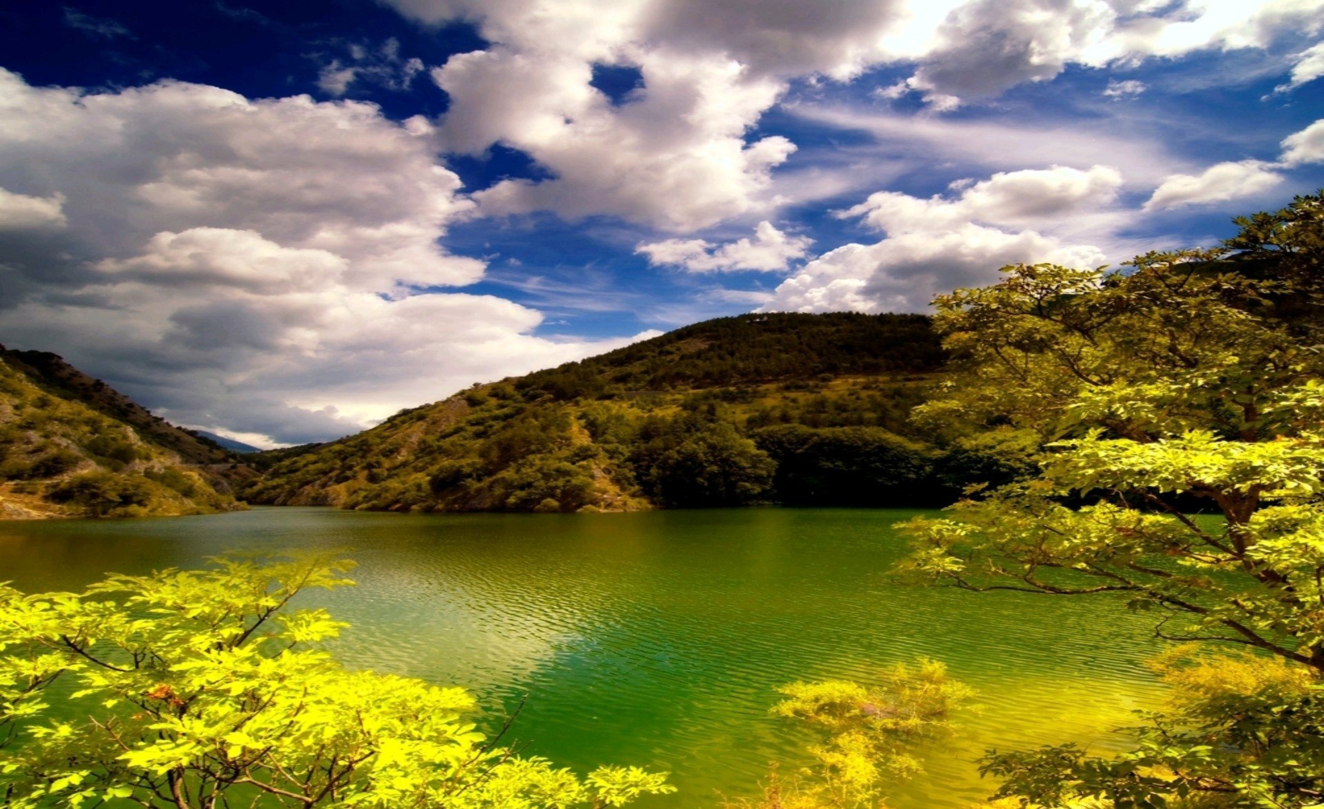 Serene Nature Lake HD Wallpaper: Tranquil Waters and Lush Green Hills