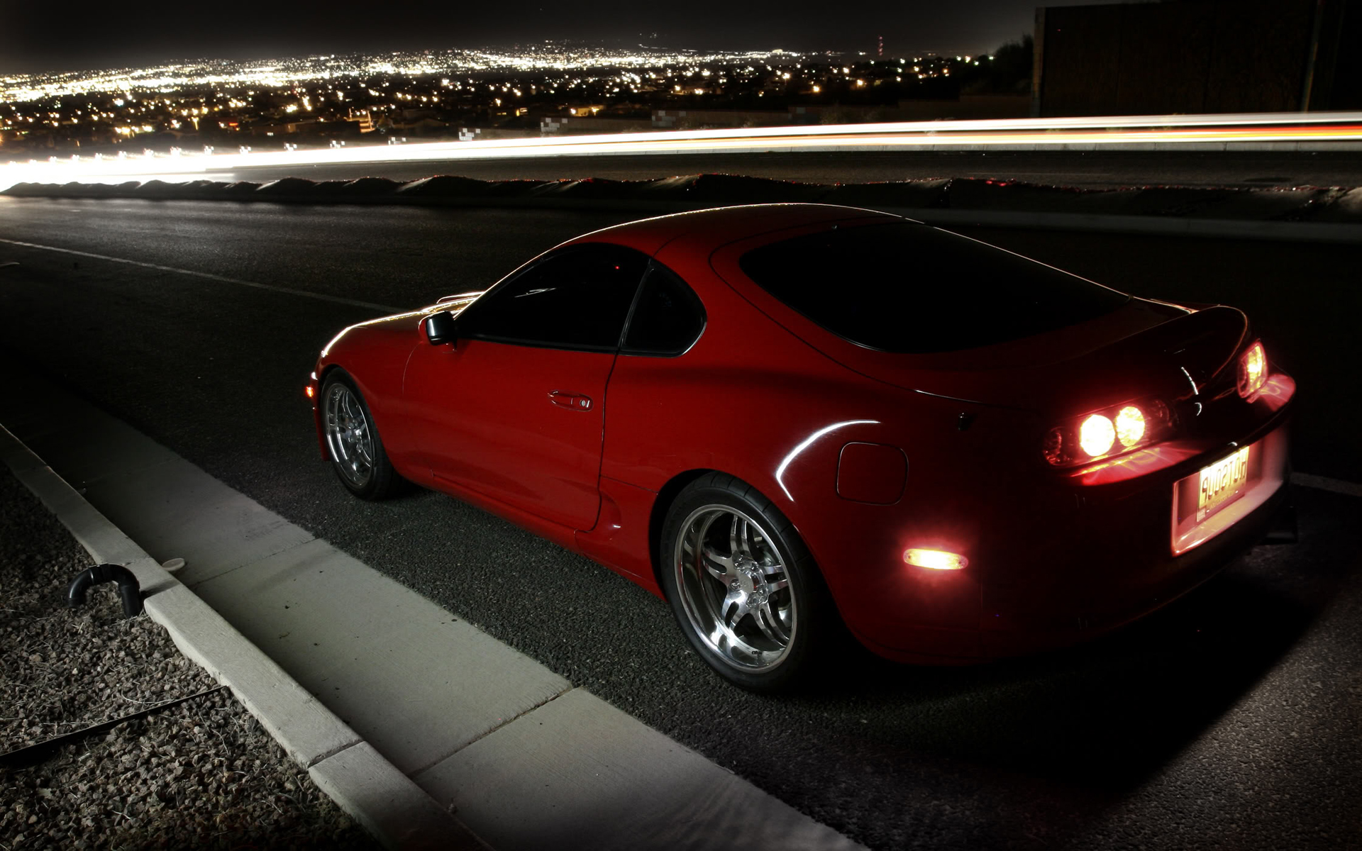 Speed and Style: HD Night Drive Vehicle Wallpaper