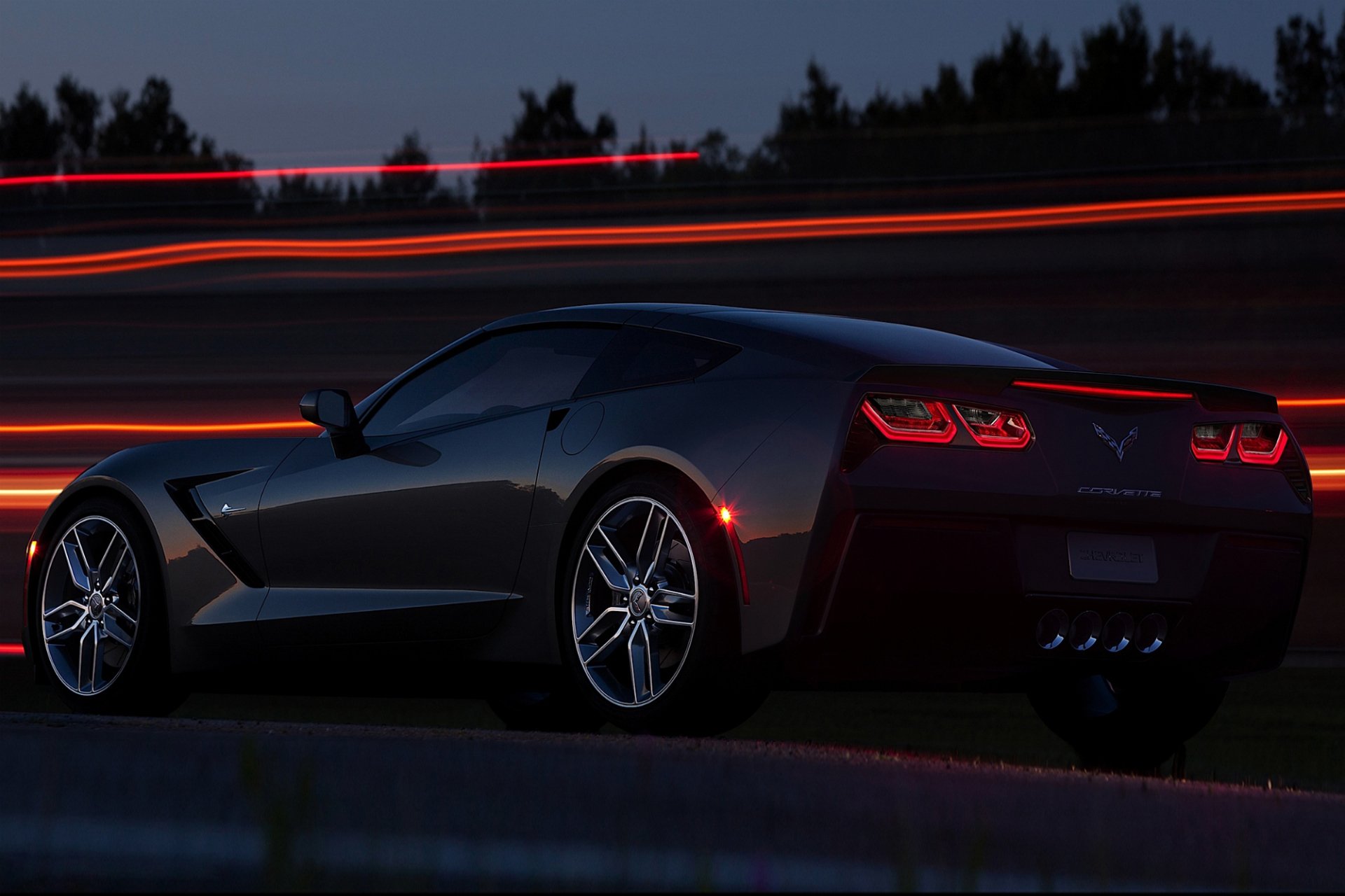 HD Wallpaper: Sleek Chevrolet Corvette in Motion at Night