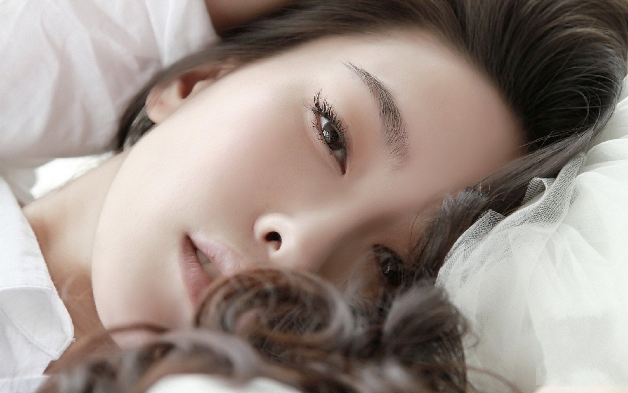 Radiant Calm: HD Portrait of a Woman's Gentle Face