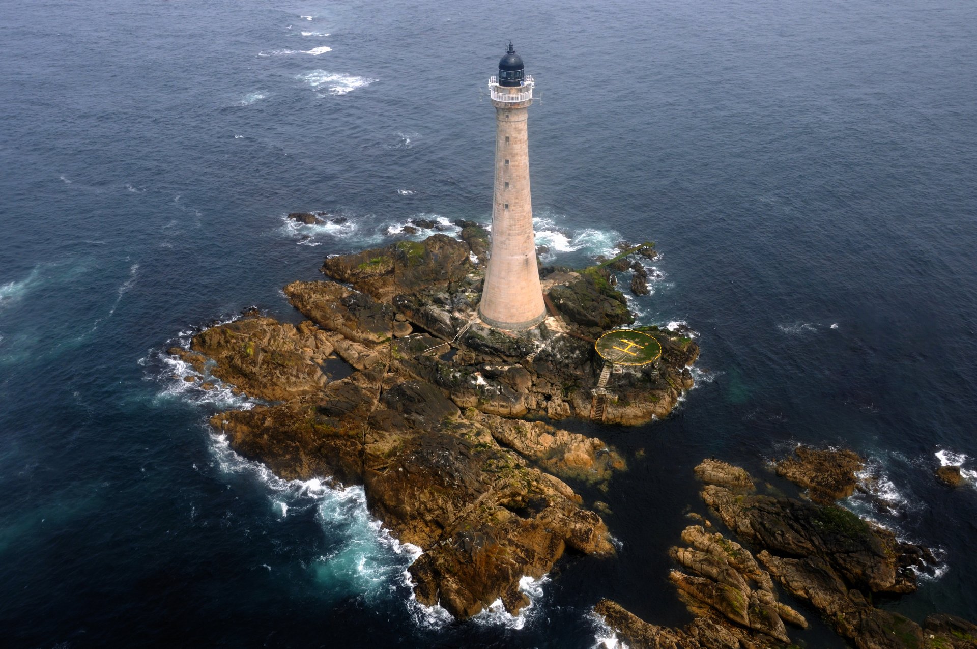 4K Ultra HD Island Lighthouse Standing Strong Amid Ocean Waves