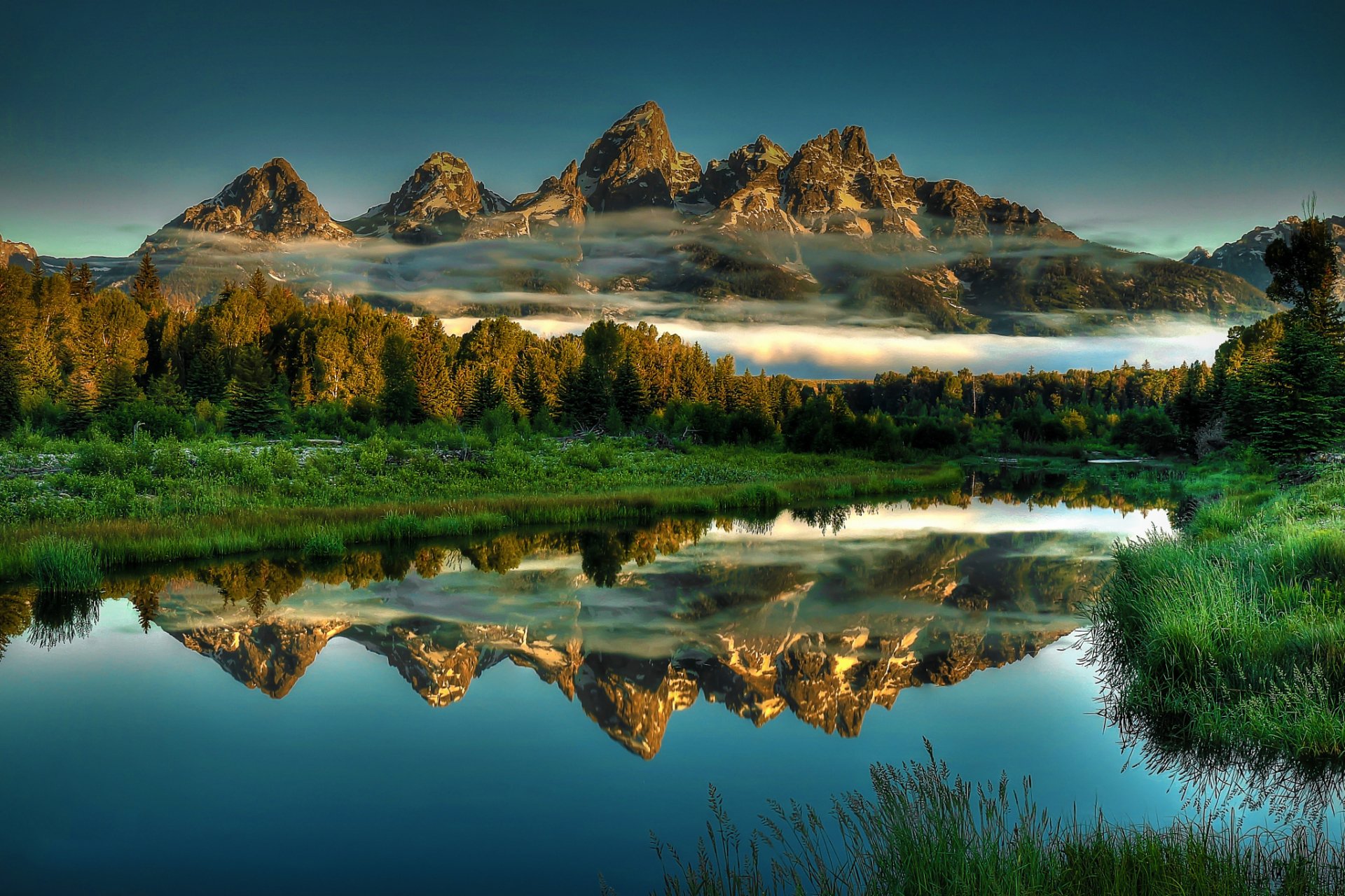 Majestic Mountain Reflection: HD Nature Wallpaper with Misty Lake and Fog