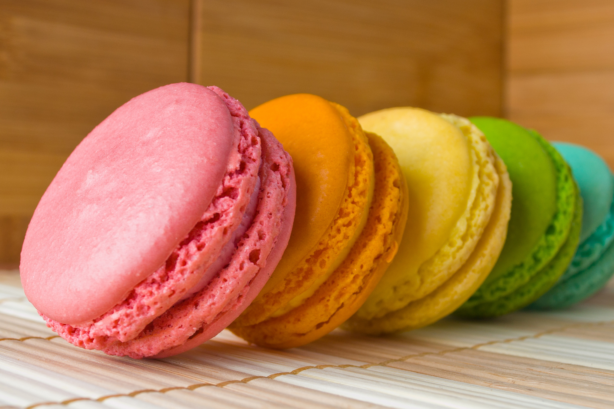 Colorful Macaron Delight: HD Sweet Treats Wallpaper
