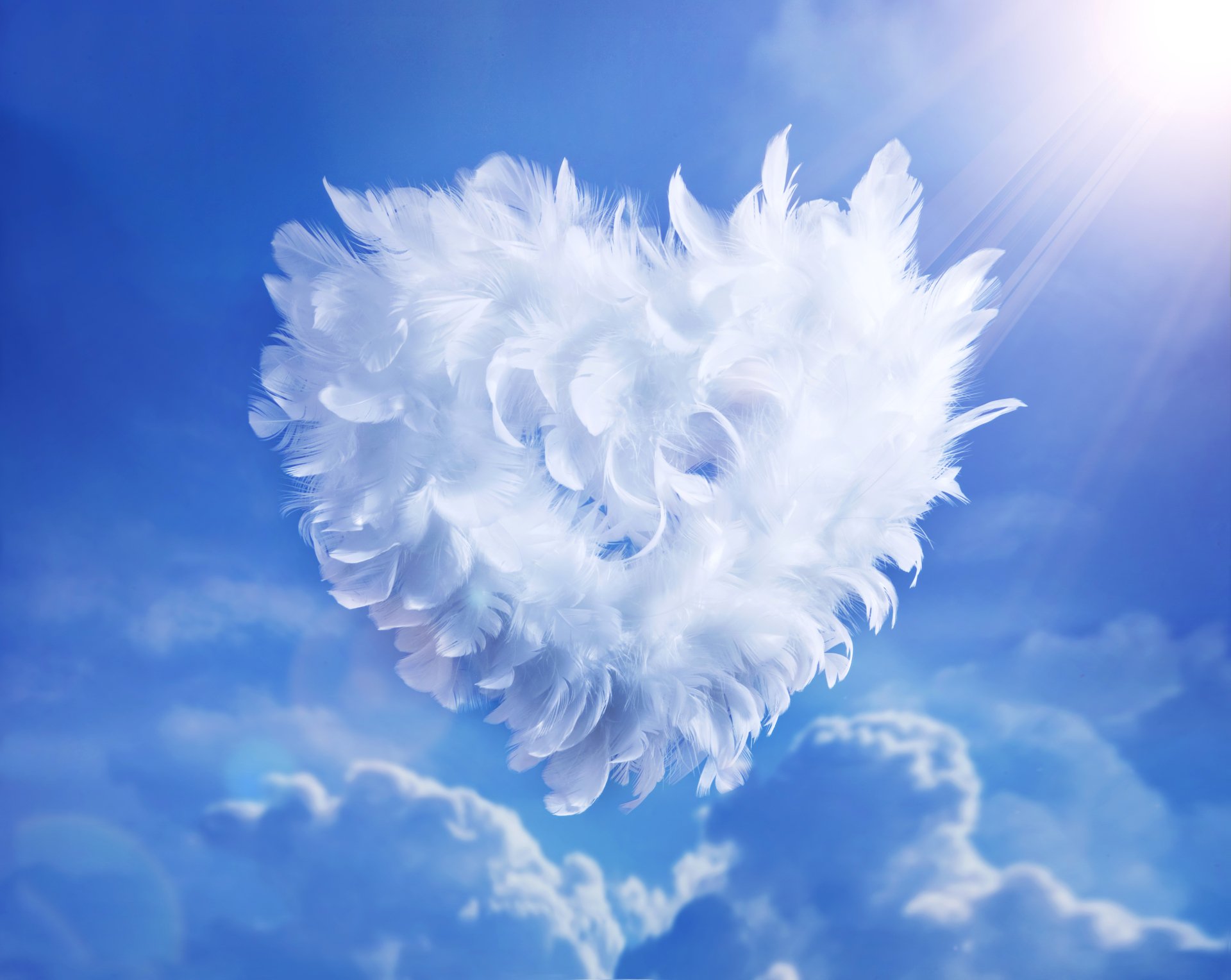 Heavenly Heart: White Feather Art in 4K Ultra HD Sky Wallpaper