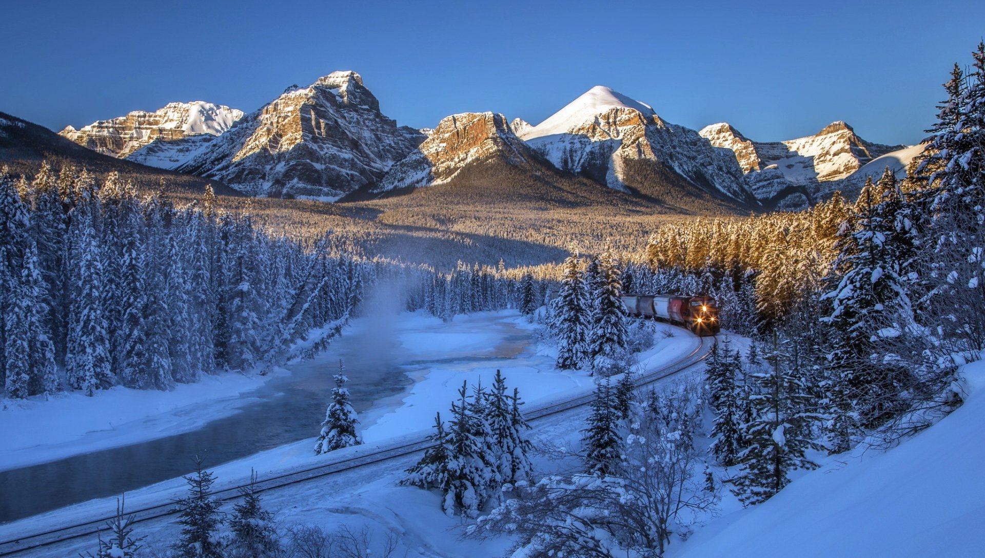 Winter Train Journey: A Stunning HD Wallpaper of Snowy Mountains and ...