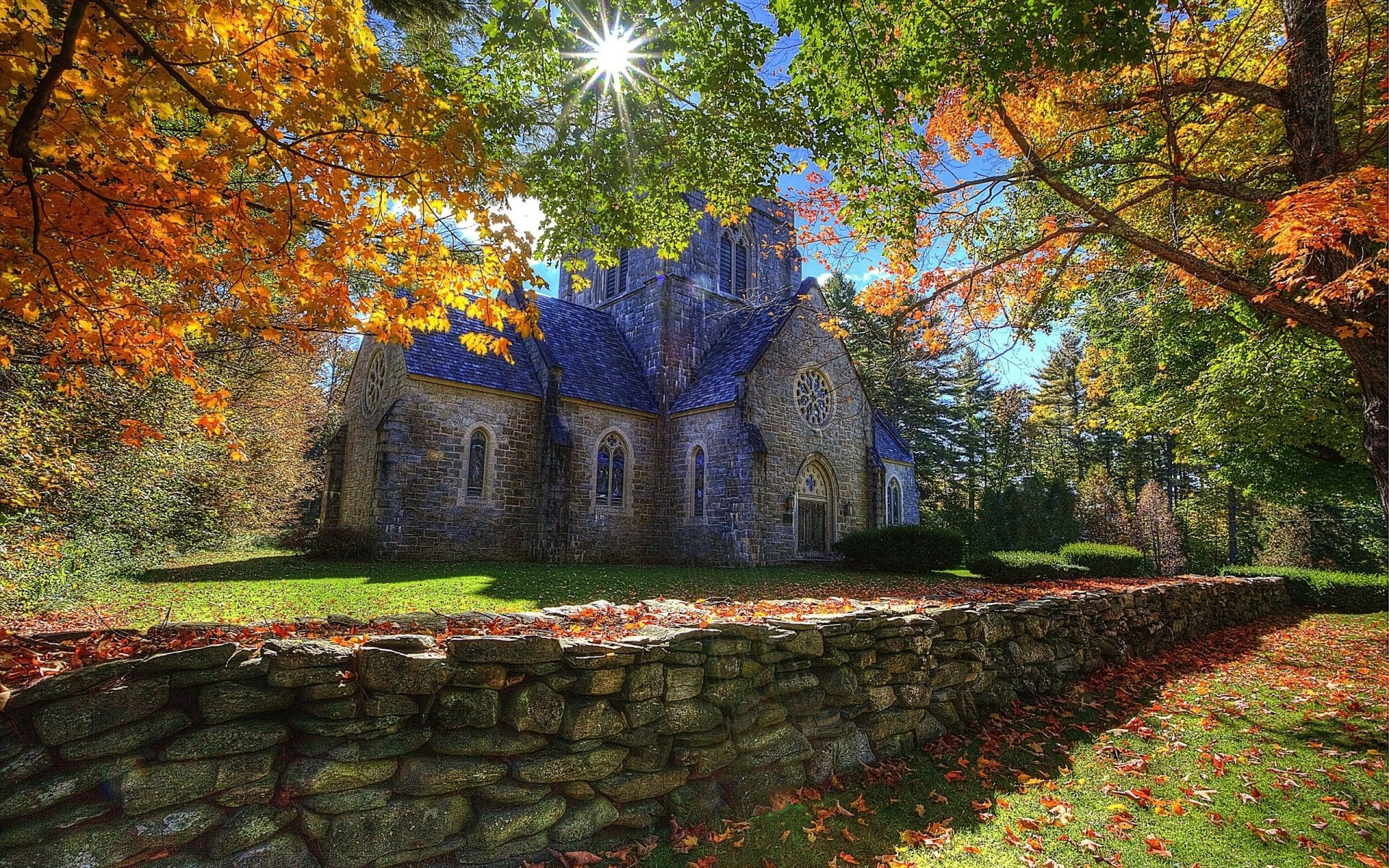 Autumn Serenity: Historic Church Embraced by Fall Foliage – HD Wallpaper