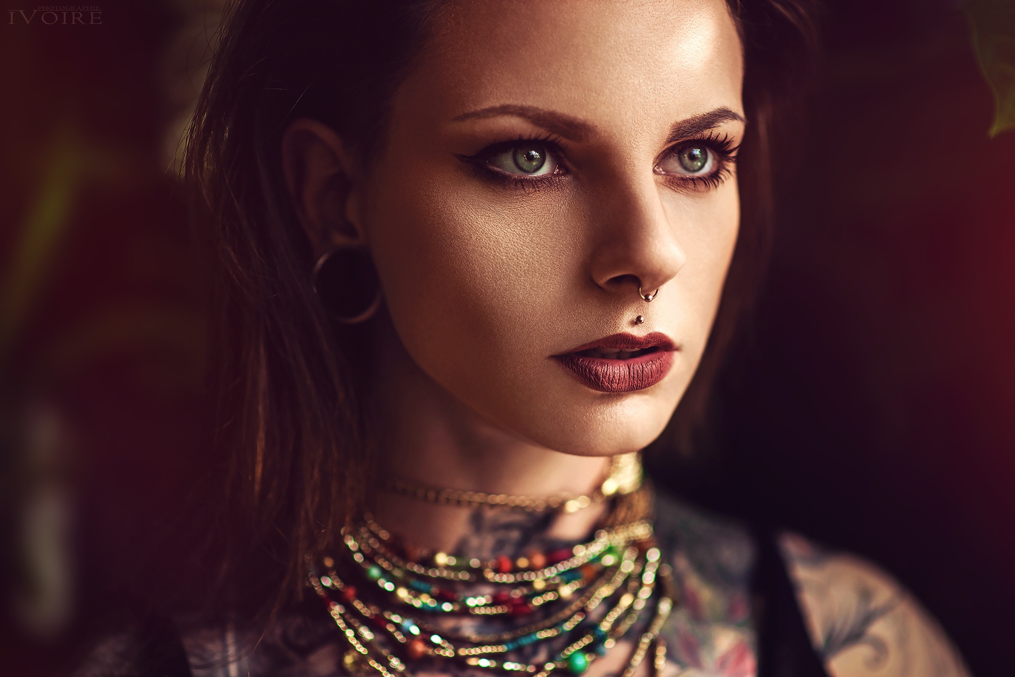 Enchanting Model with Green Eyes, Bold Lips & Unique Tattoos – HD ...