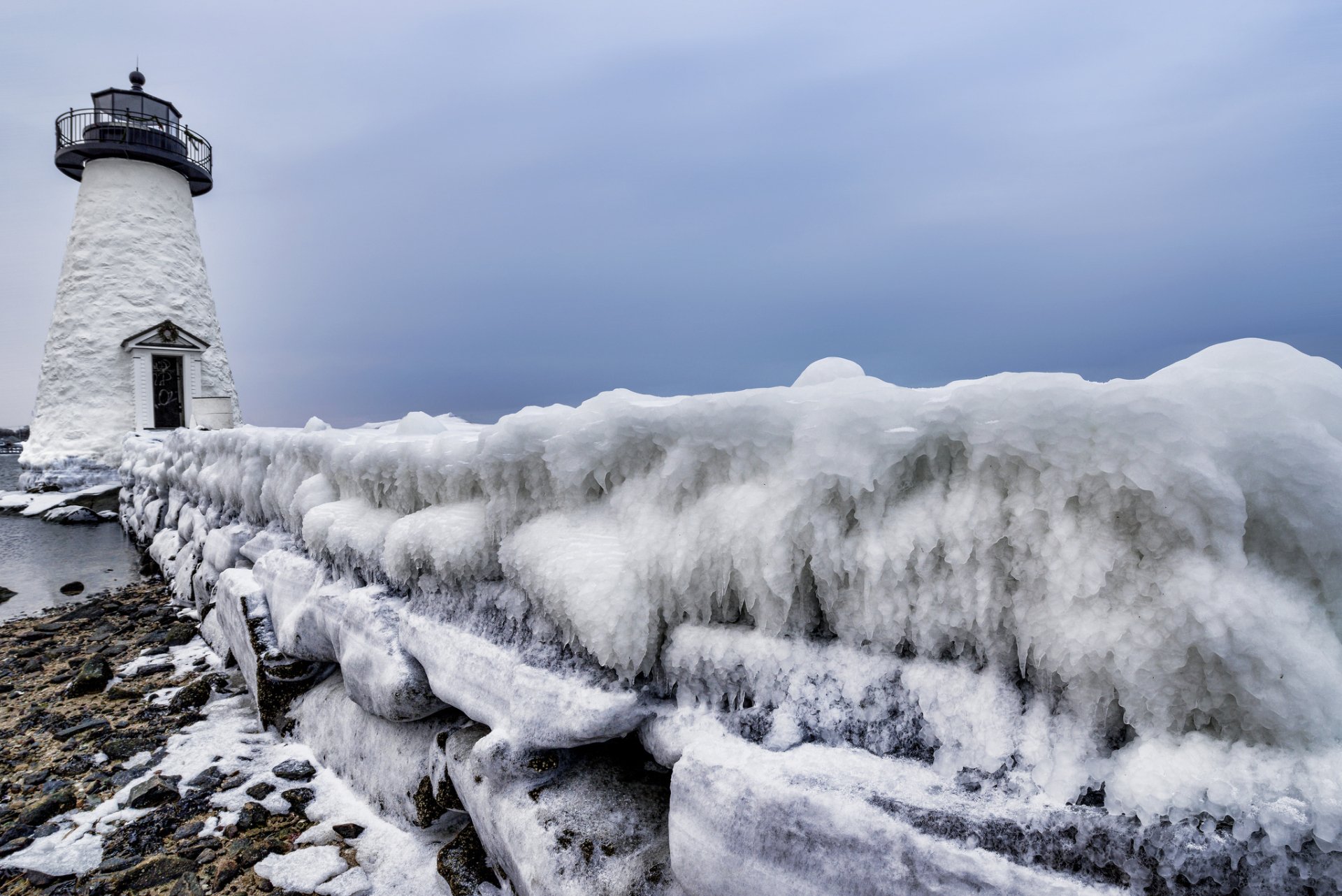 Winter’s Frozen Beacon: HD Lighthouse Amidst Ice and Snow | 2048x1367 ...