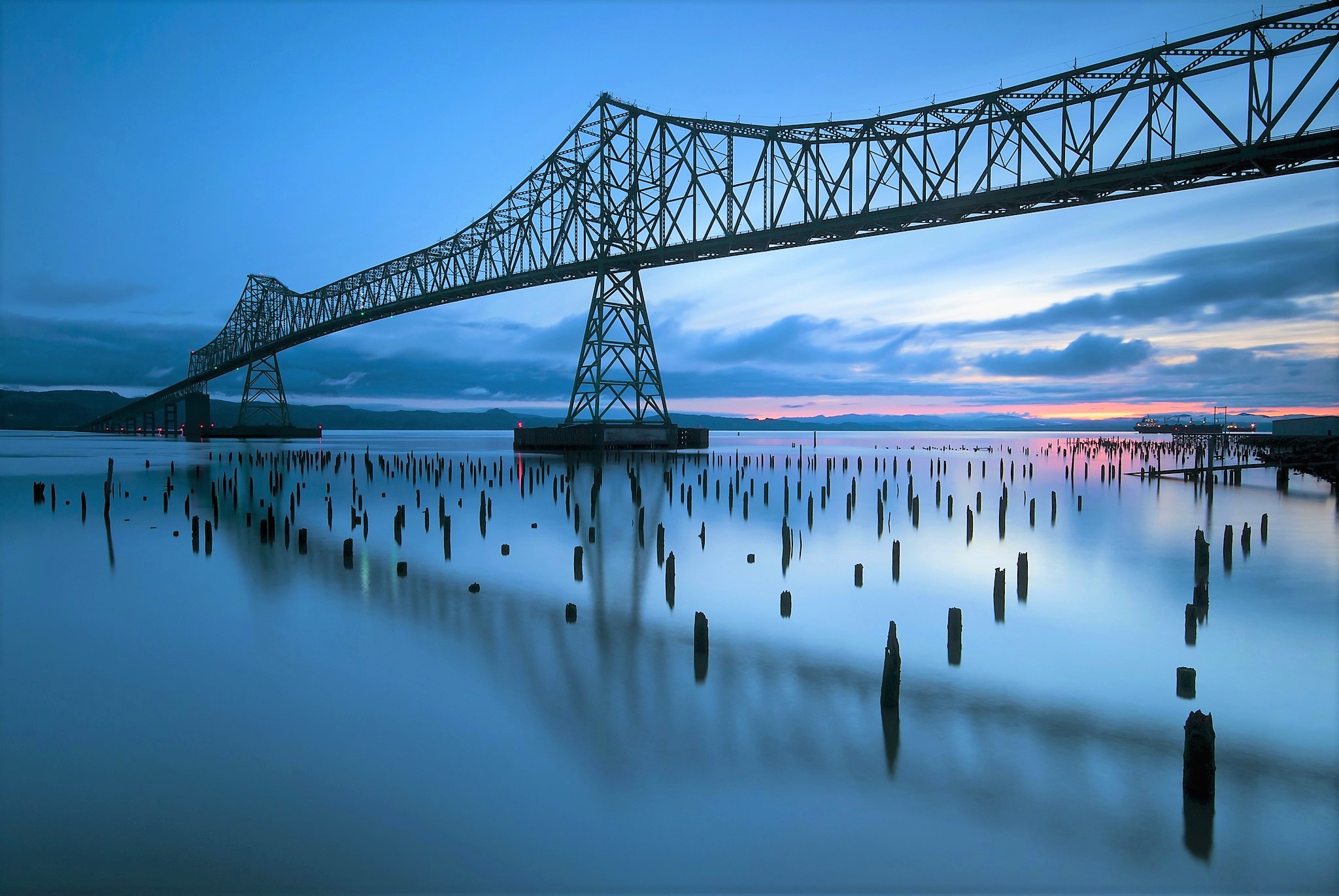 Blue Sunset Bridge: A Serene HD Cloudscape with Man-Made Elegance