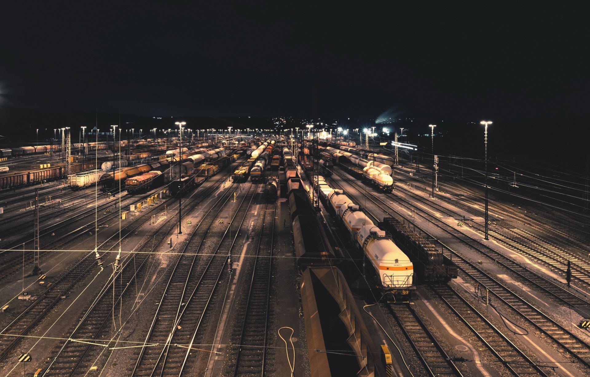 Nightfall on the Rails: HD Train Yard Under City Lights
